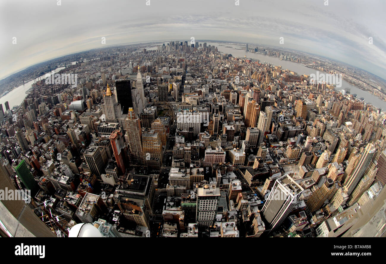 A view of downtown Manhattan from the empire state building through a ...