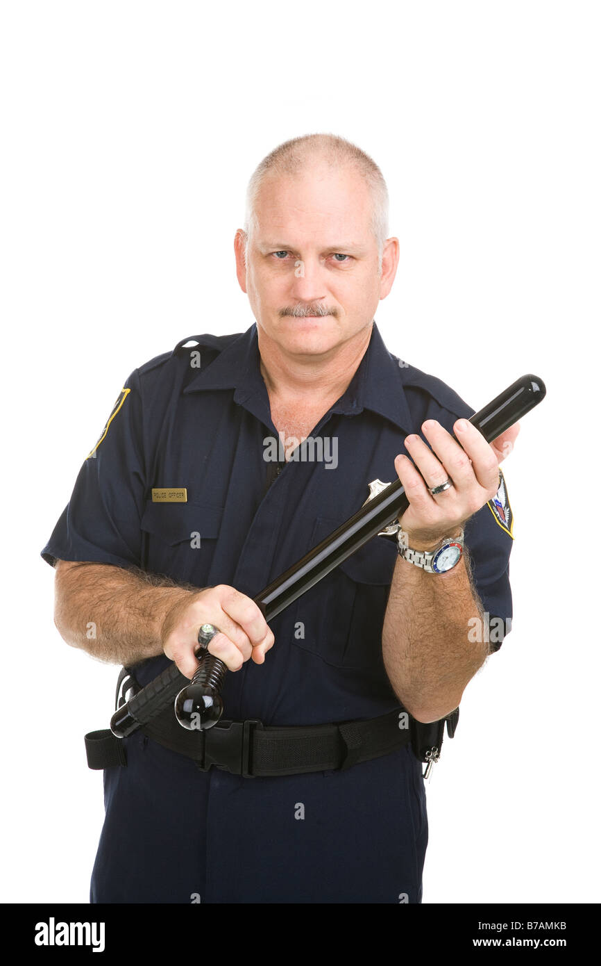 Police officer gets ready to use his night stick Isolated on white ...