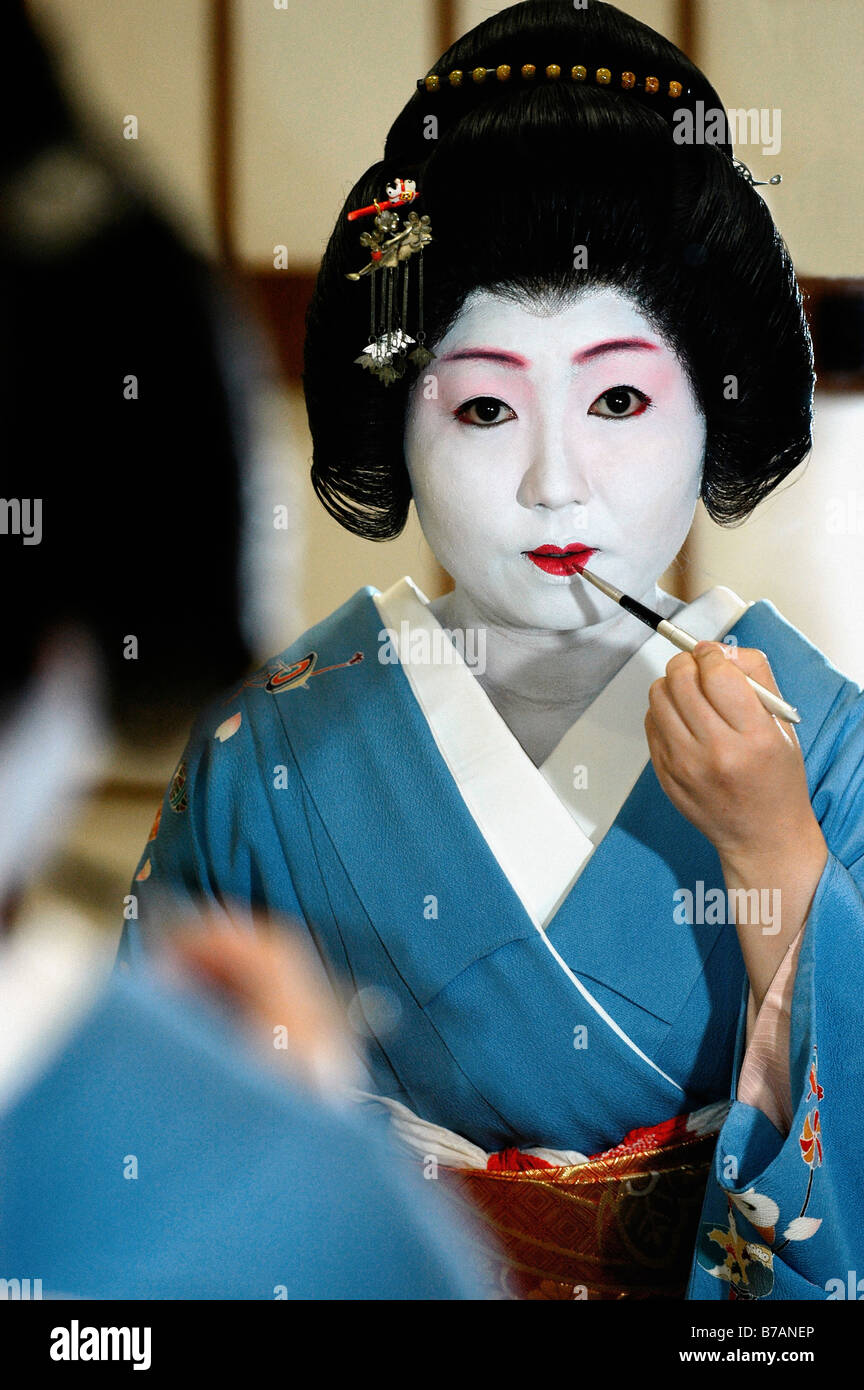 A geisha, who goes by the name Norie, prepares for work in Tokyo Japan ...