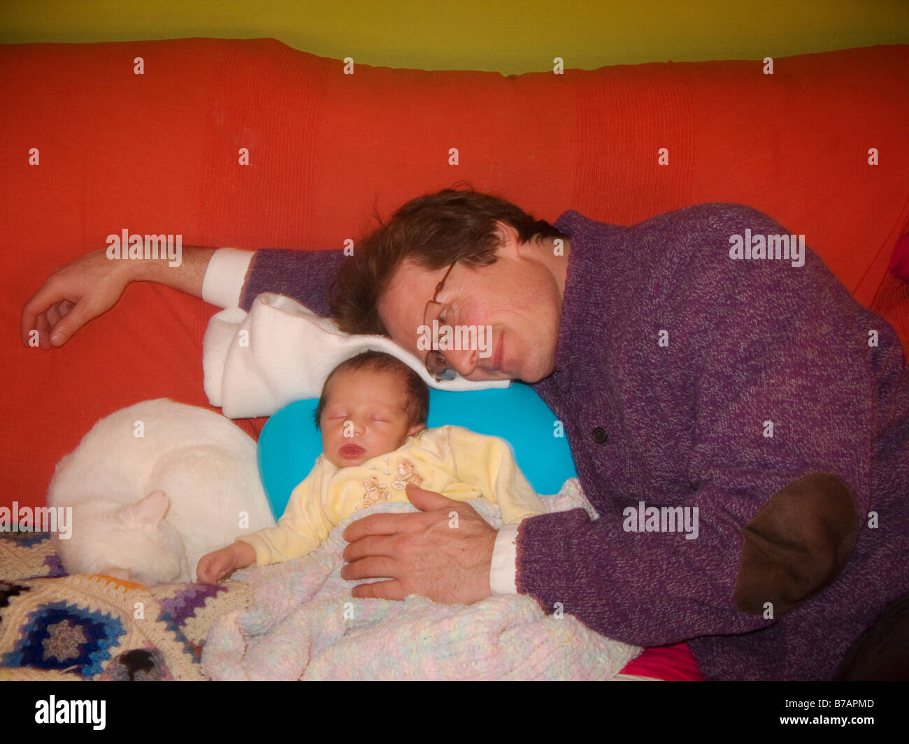 English father with his 8 day old son Stock Photo - Alamy