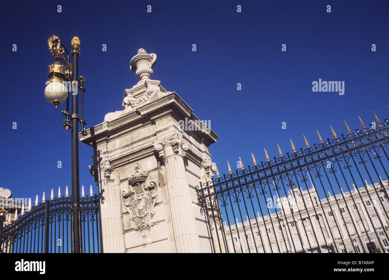 Entrance gate to Plaza de la Armeria and Royal Palace, Madrid, Spain ...