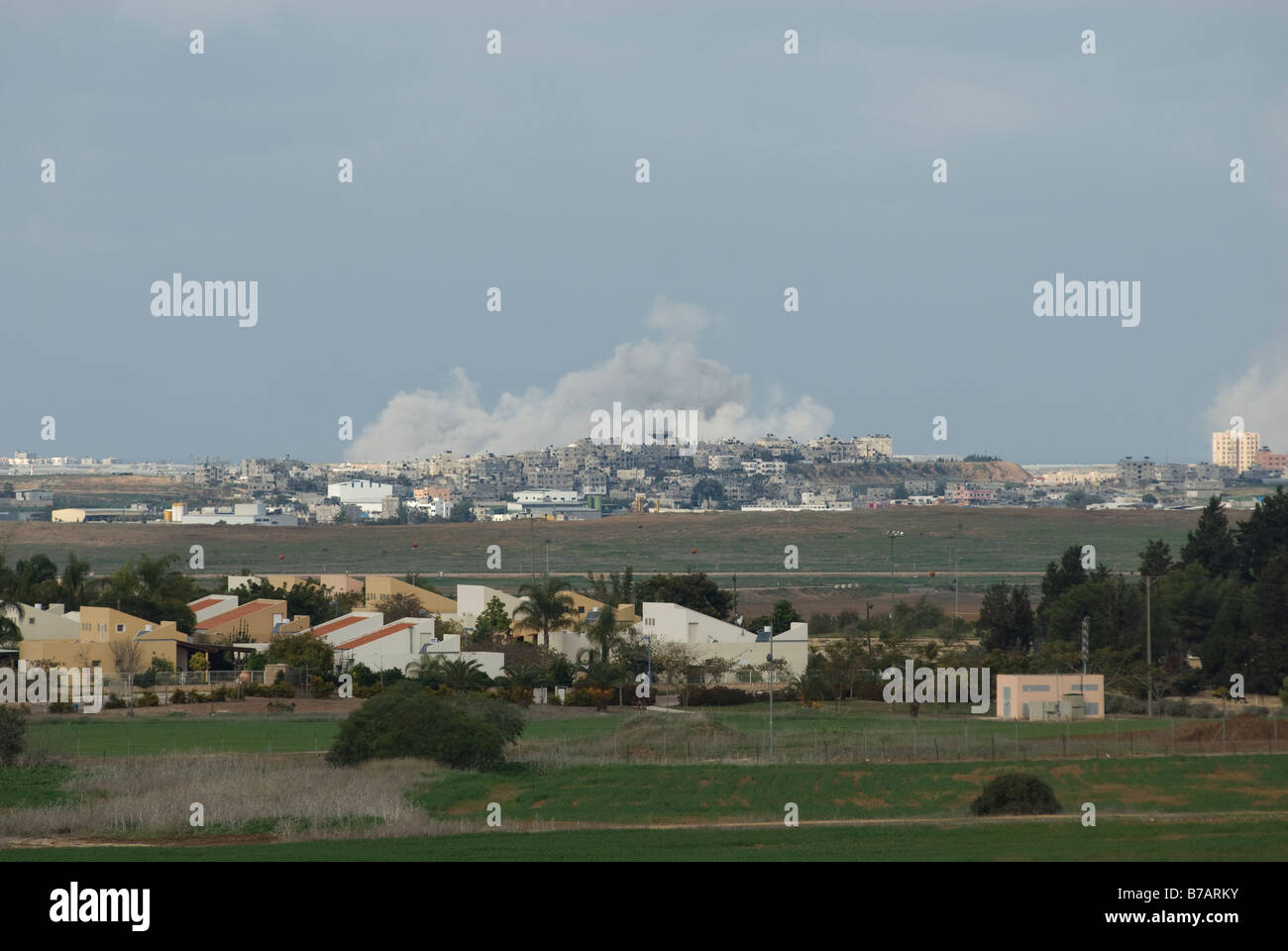 View across Kibbutz Kfar Aza of an Israeli air strike on Hammas ...