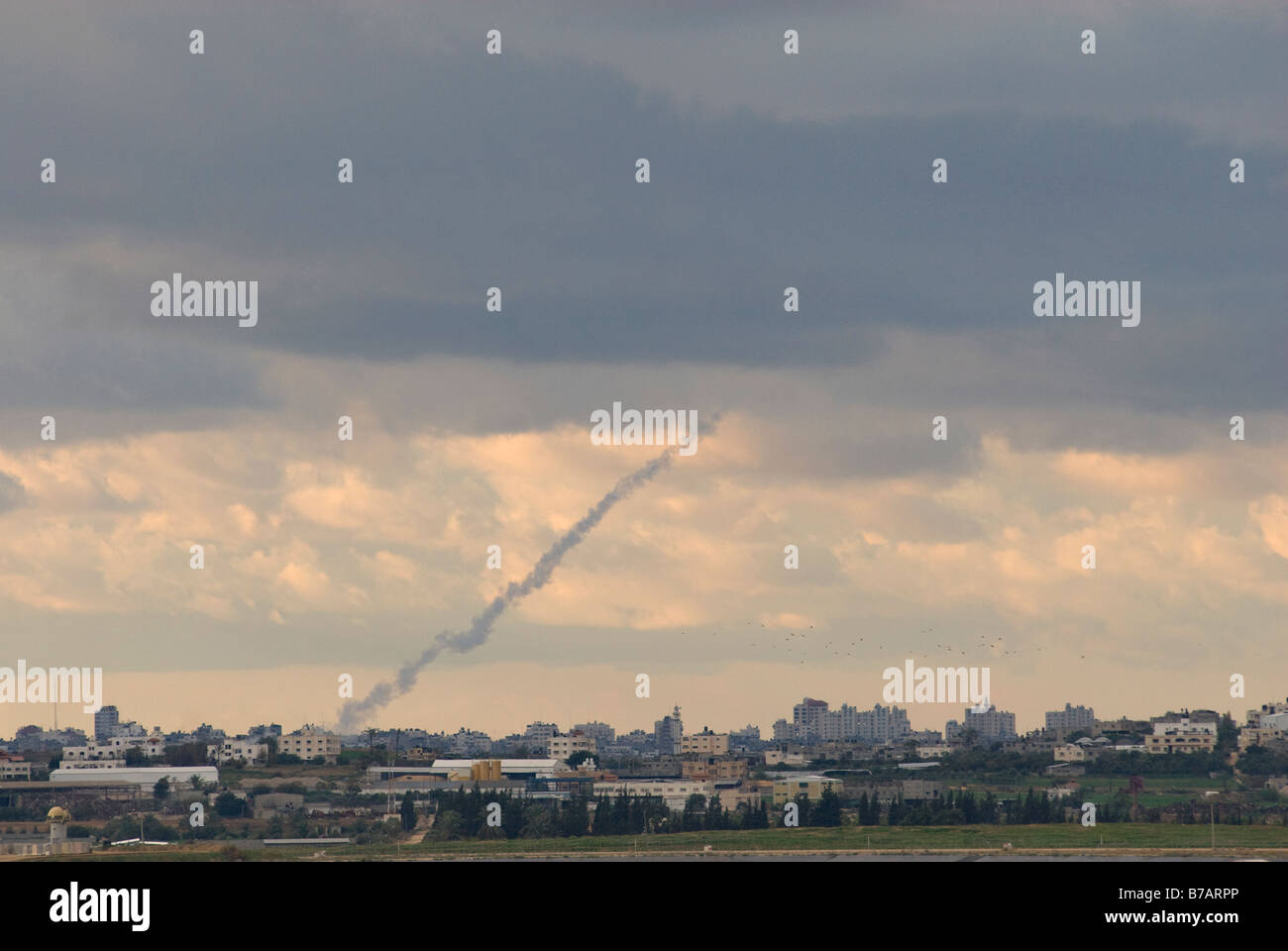 Smoke trail of a Grad rocket launched by Hamas from the Gaza Strip into ...