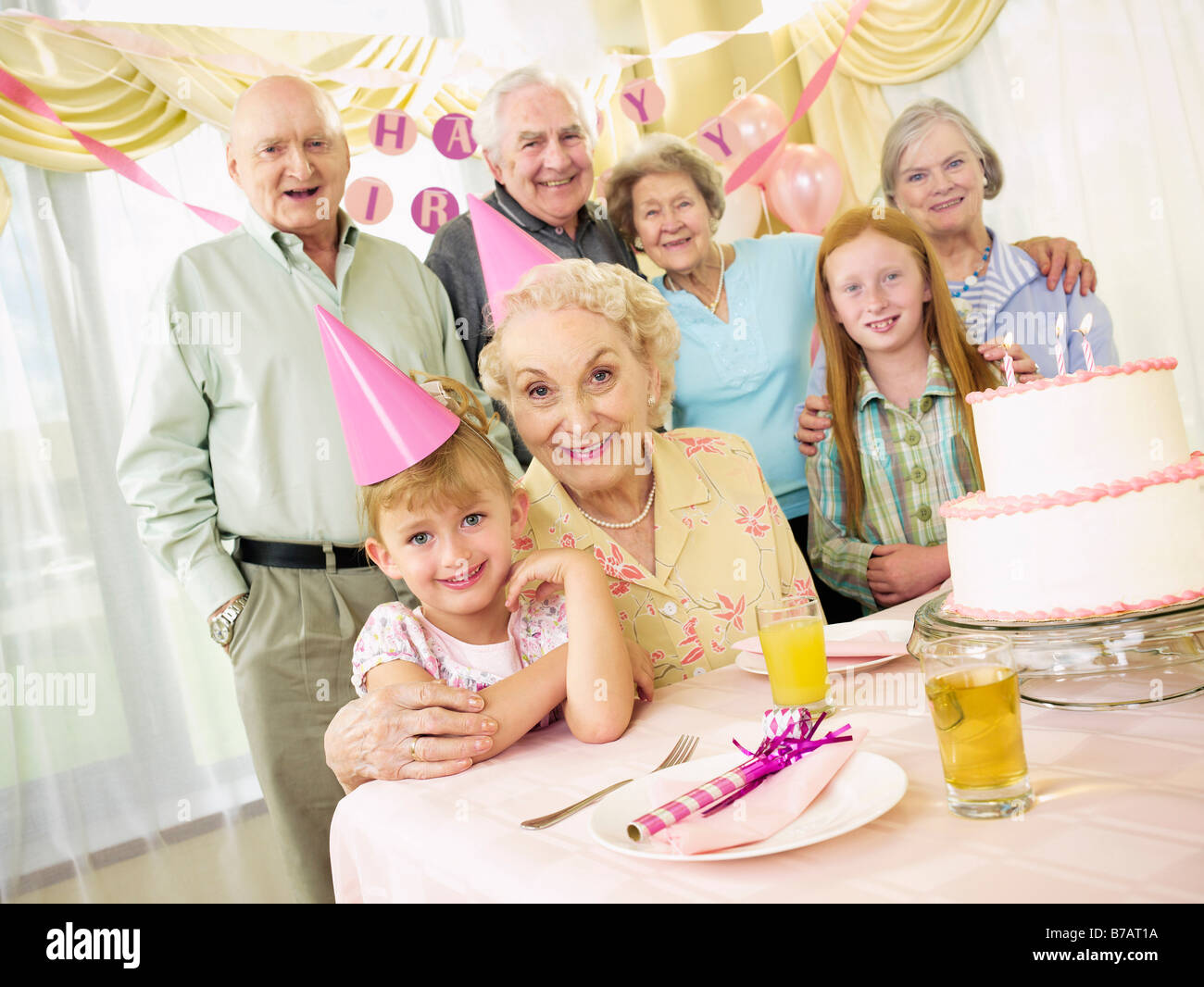 Birthday Celebration in Senior's Home Stock Photo - Alamy