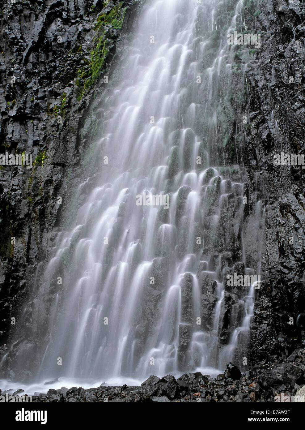 Falling water in small rock waterfall Stock Photo - Alamy