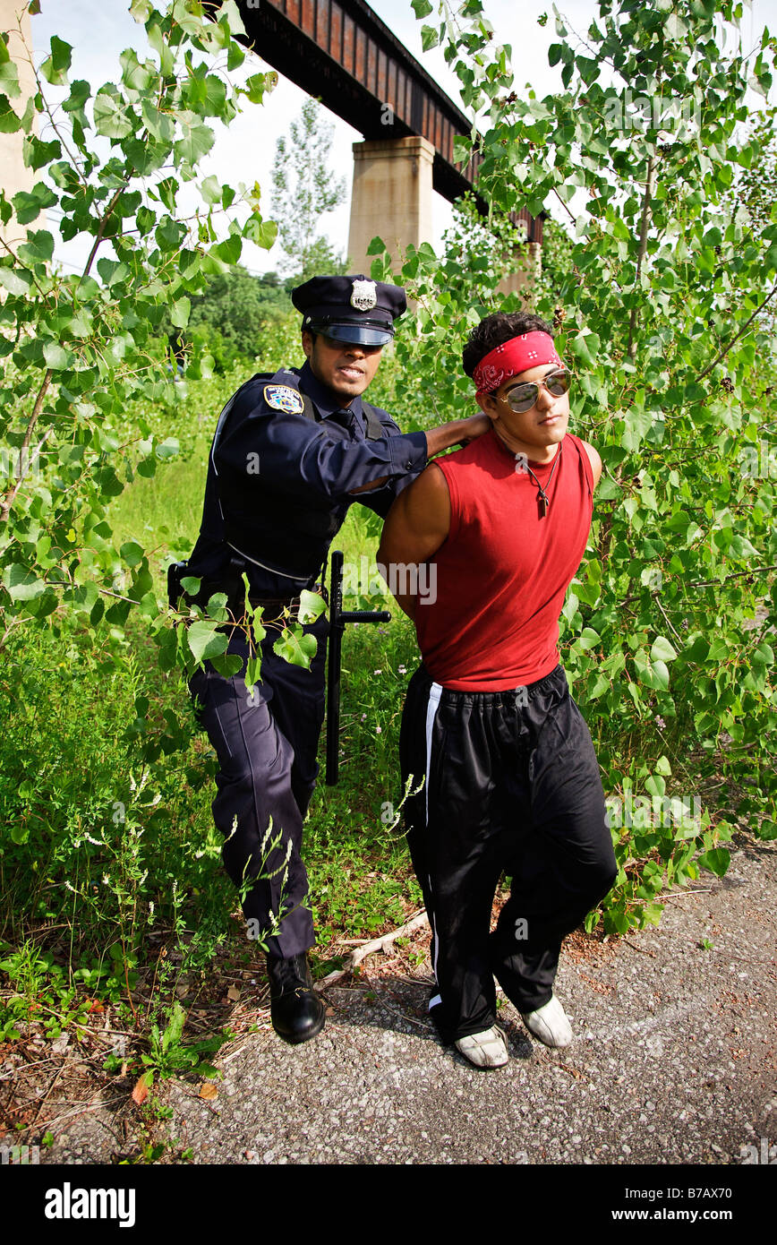 Police Officer Arresting Suspect Stock Photo - Alamy
