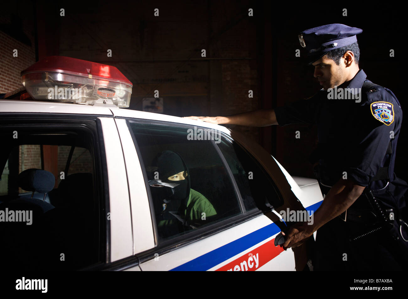 Male police officer arrested hi-res stock photography and images - Alamy