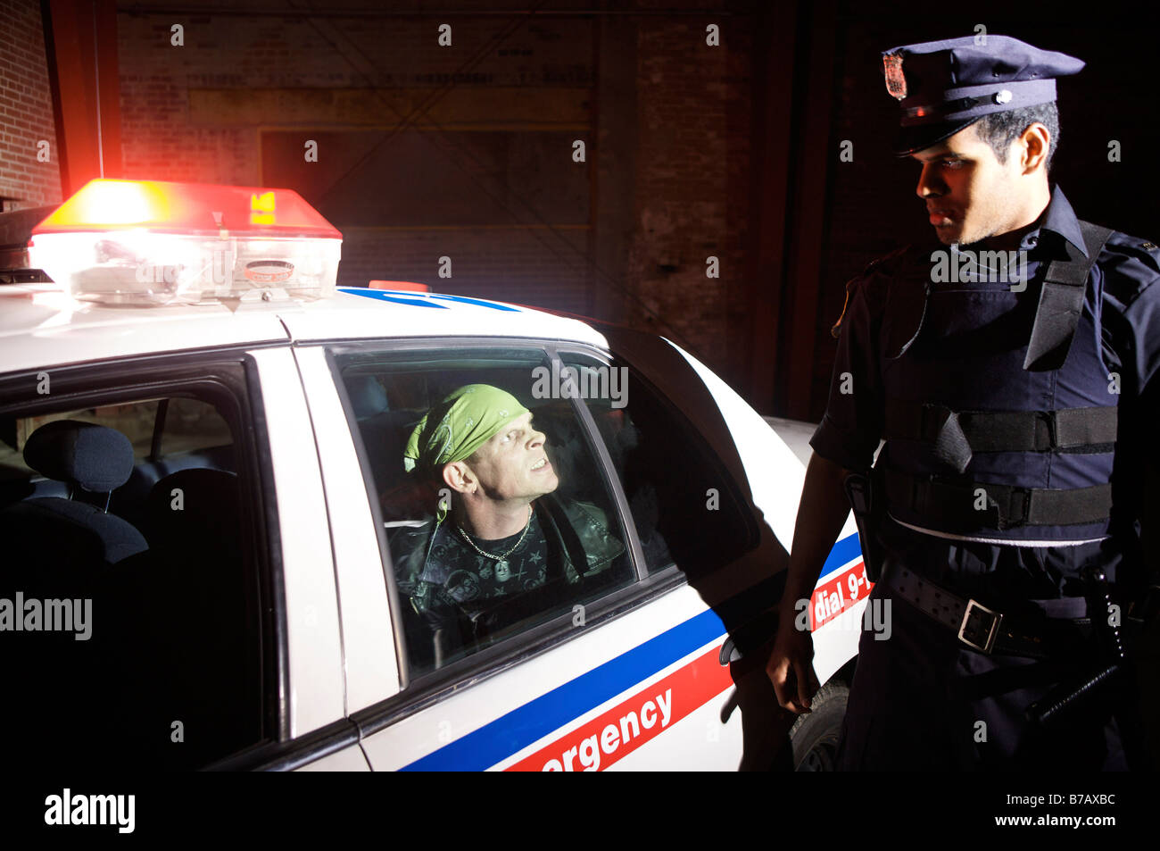 Police Officer Arresting Suspect Stock Photo - Alamy
