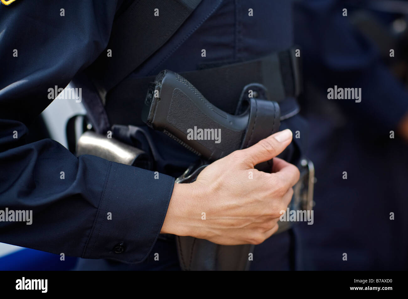 Police officers gun hi-res stock photography and images - Alamy