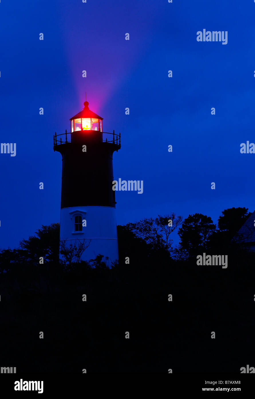 Nauset Light shines during a stormy night Cape Cod National Seashore ...