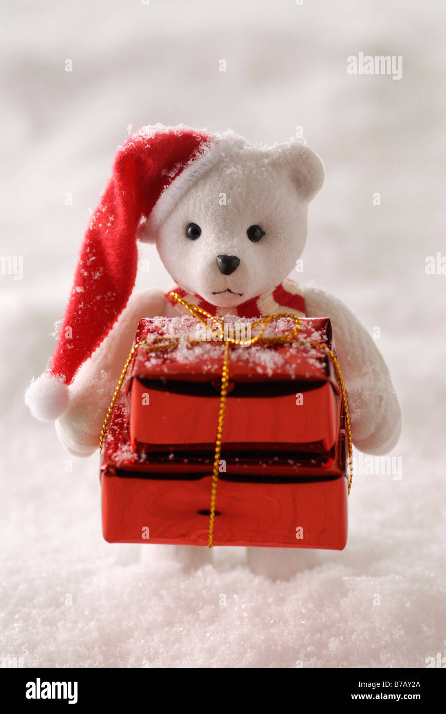 Bear Figurine Holding Presents Stock Photo - Alamy