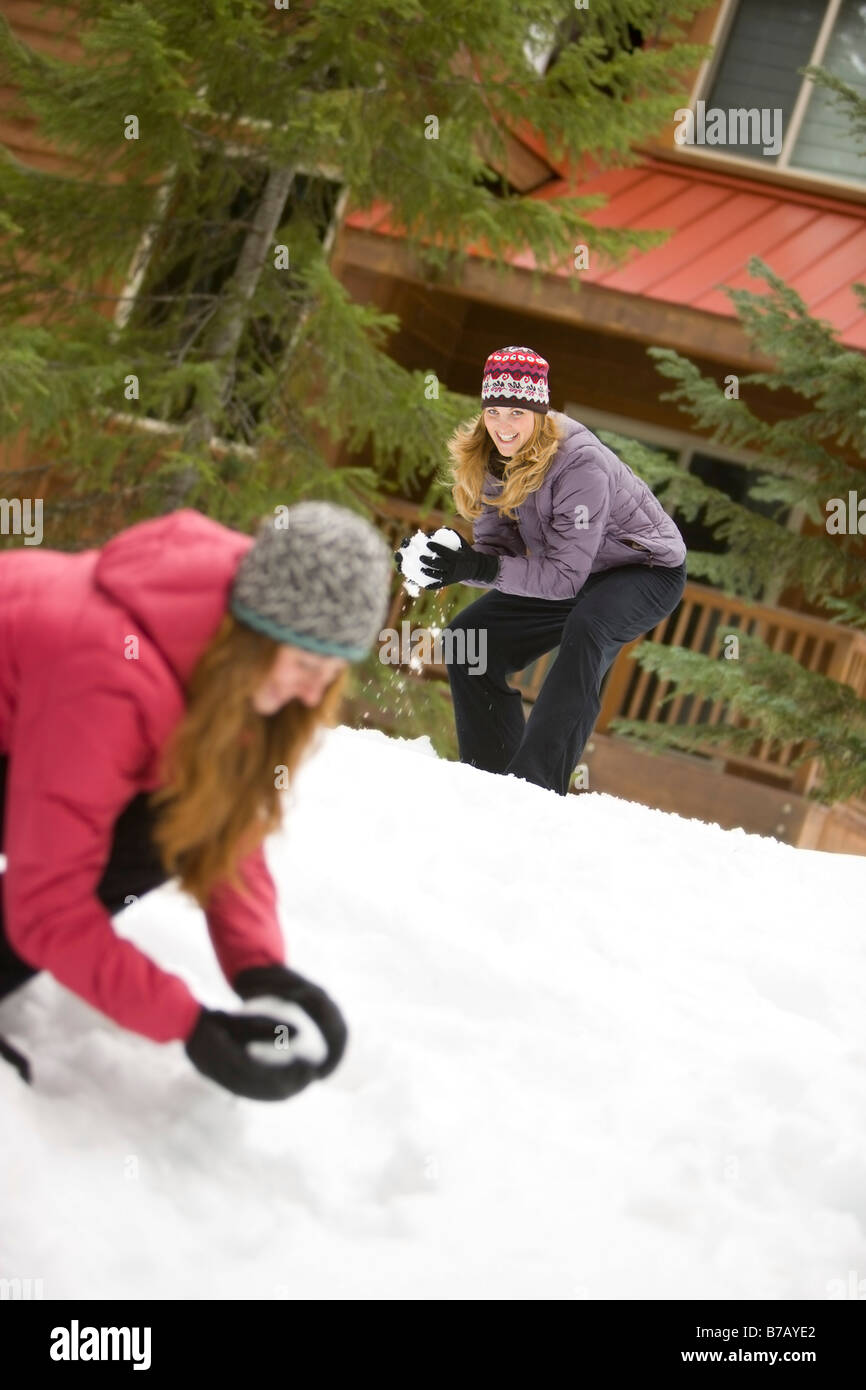 Women Throwing Snowballs, Government Camp, Oregon, USA Stock Photo - Alamy
