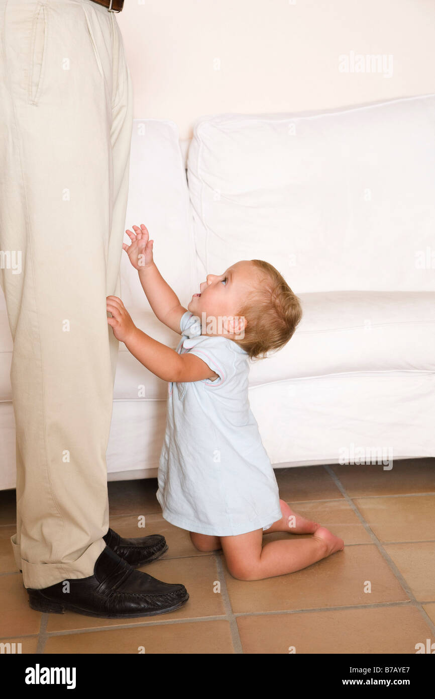 Person kneeling with arm raised hi-res stock photography and images - Alamy