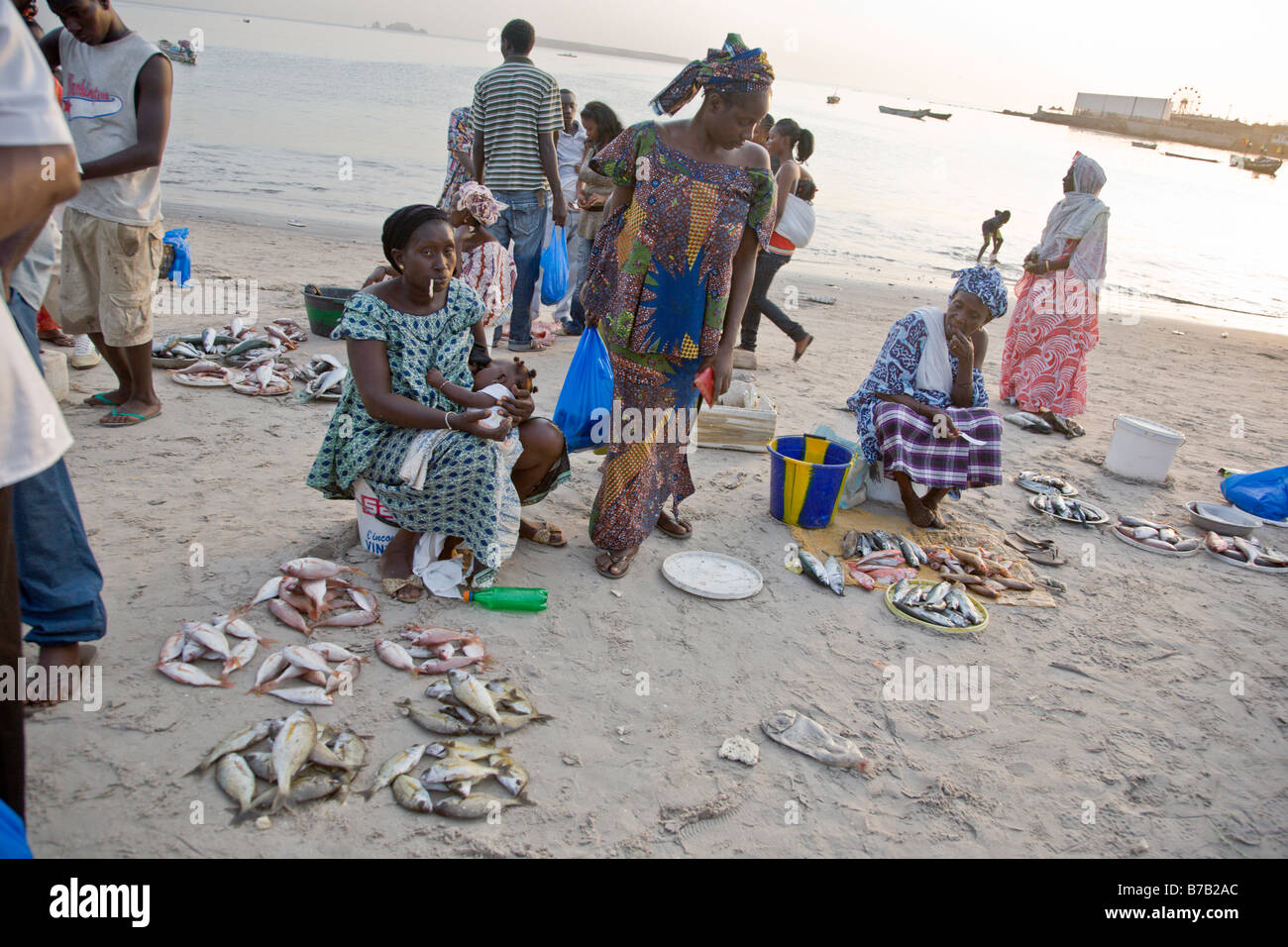 Piles of fish for sale dot the beach at this fish market in Dakar ...