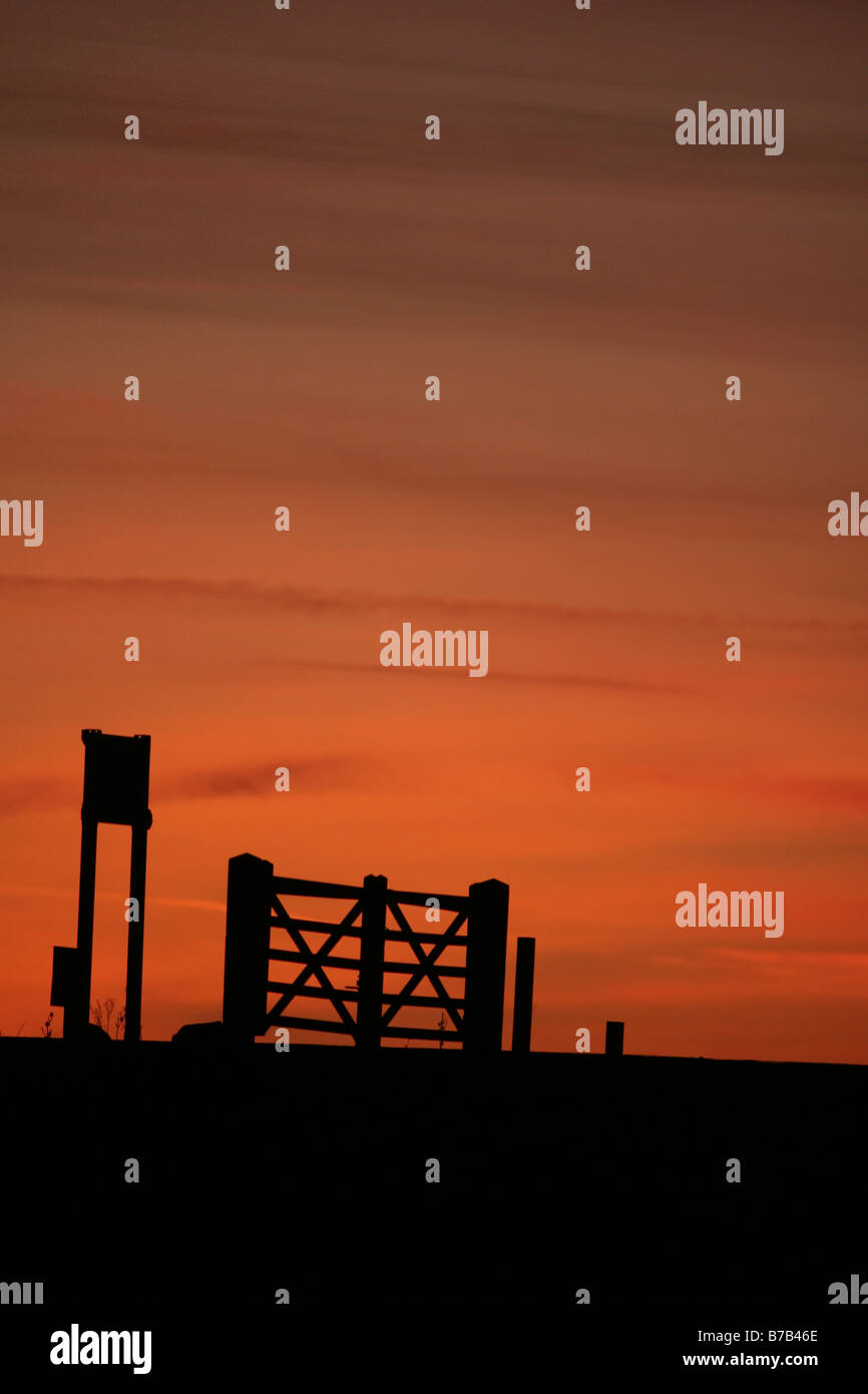Gate at sunset Stock Photo - Alamy