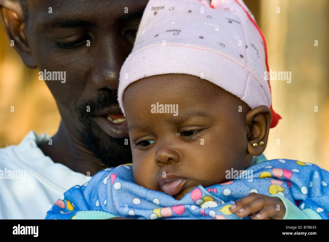 Malian Father and Baby in Diboli Mali Stock Photo - Alamy