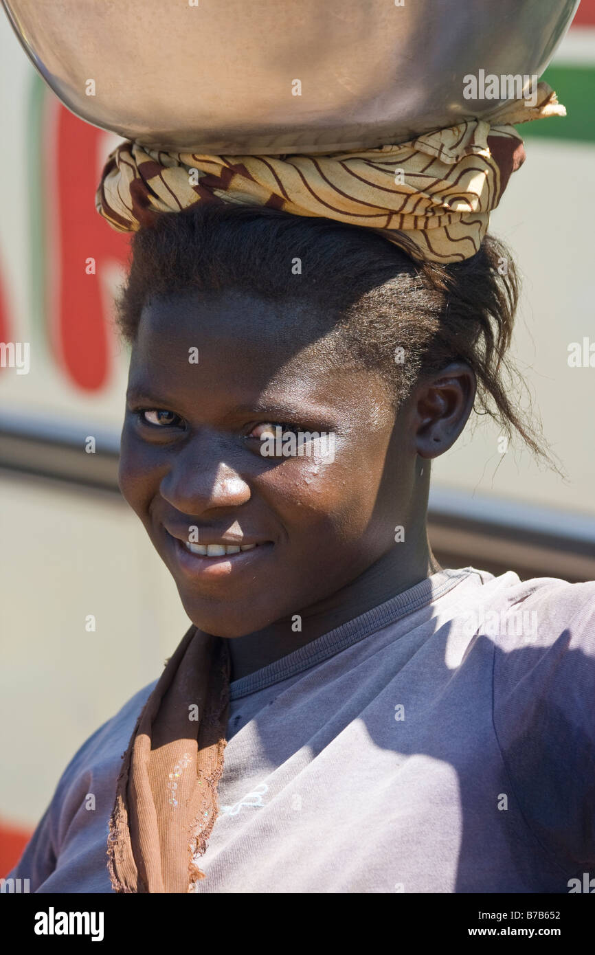 Young Malian Woman Carrying a Bowl on Her Head in Bamako Mali Stock ...