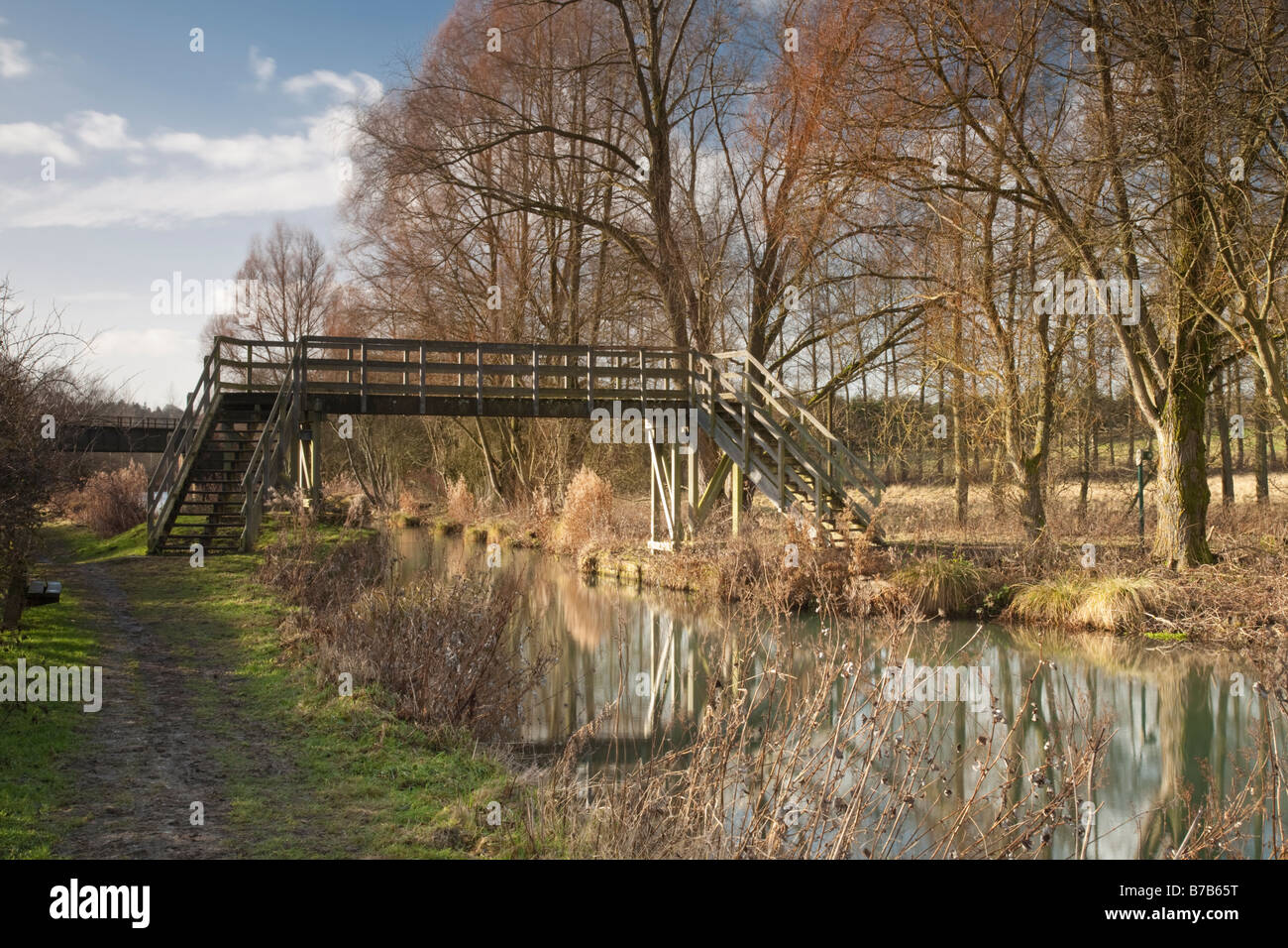 Wooden footbridge over the Kennet and Avon Canal near Hungerford in ...