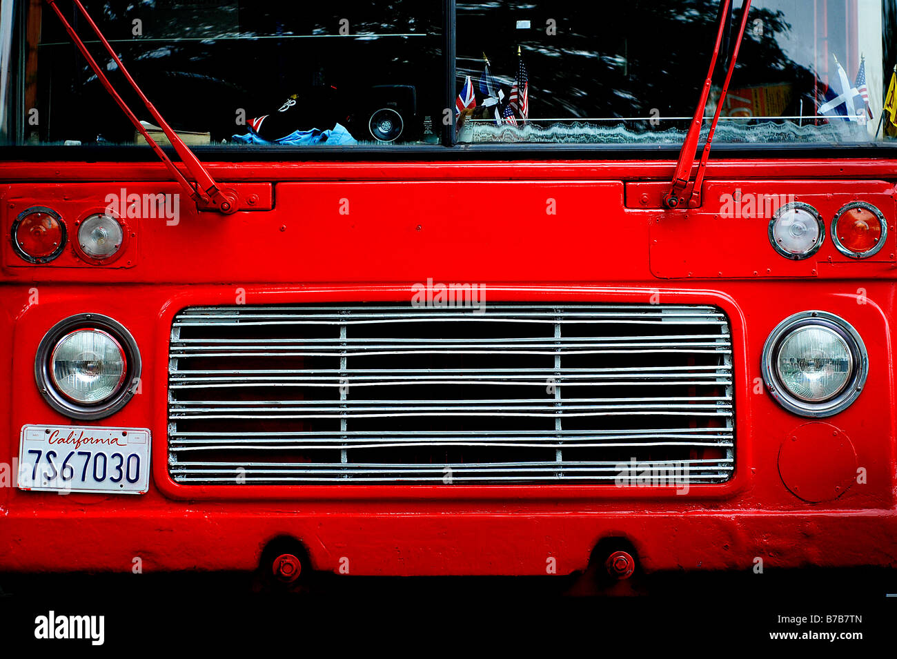 The front of a red classic van with a California license plate Stock ...