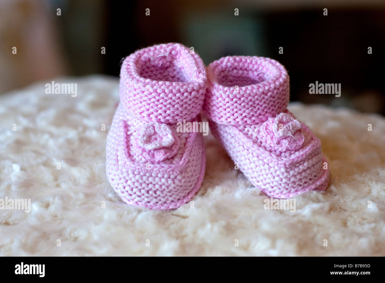 Pink Baby's Booties Stock Photo - Alamy