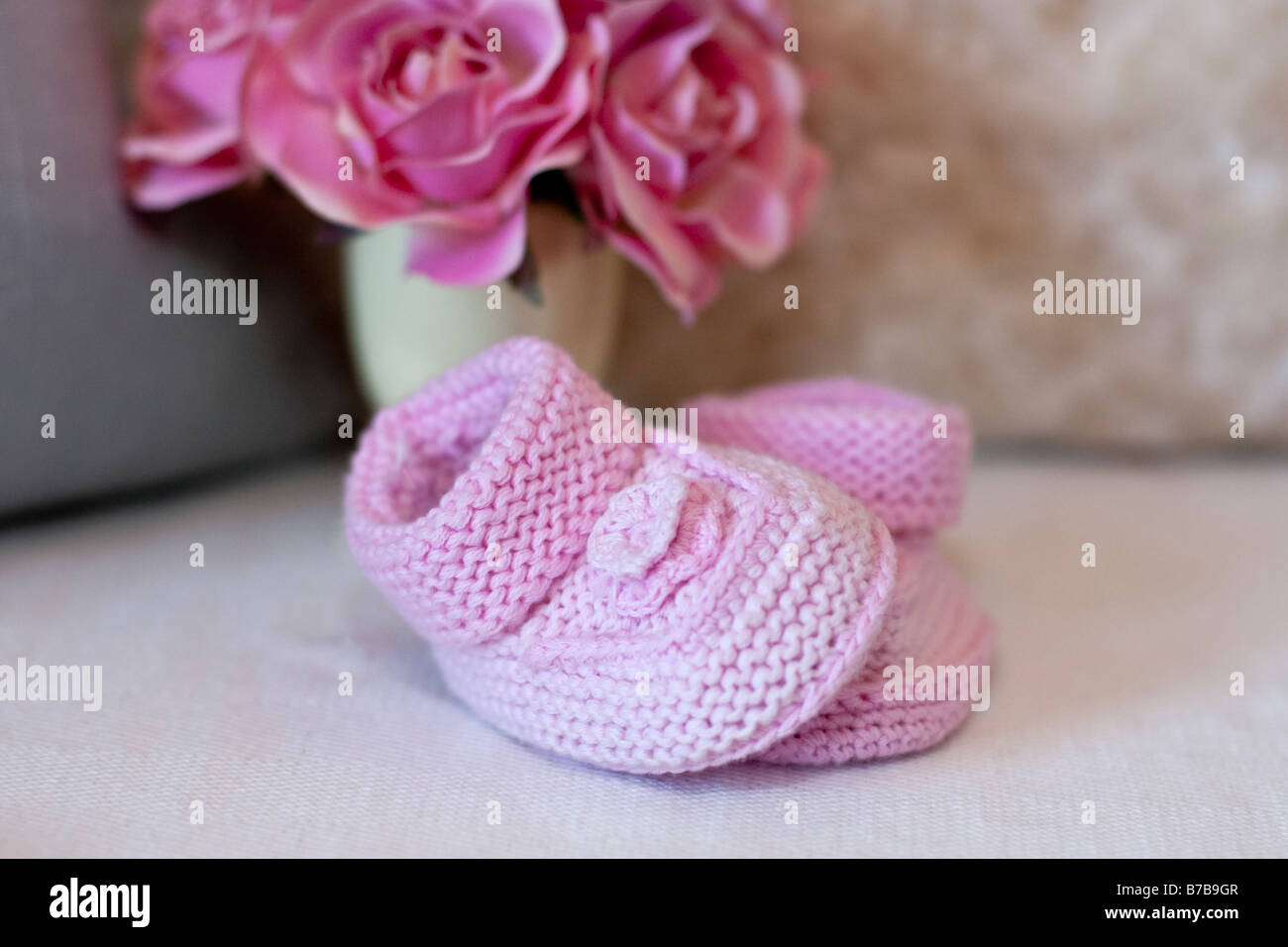 Pink Baby's Booties Stock Photo - Alamy