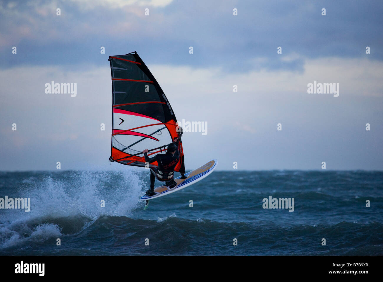 Windsurfer flies through the air Dollymount Beach Bull Island Dublin ...