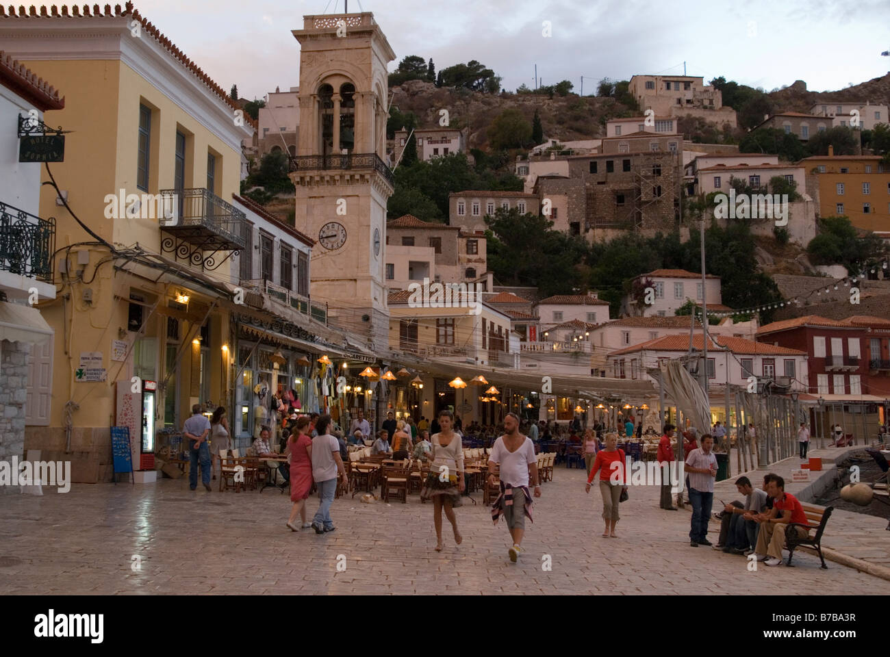 Hydra Town waterfront cafe life at sunset, Hydra Island, Greece Stock ...