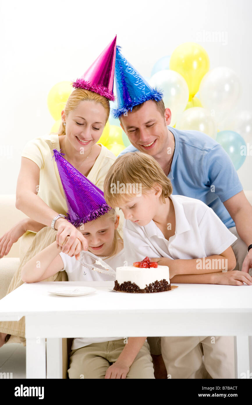 Father son cutting birthday cake hi-res stock photography and images ...