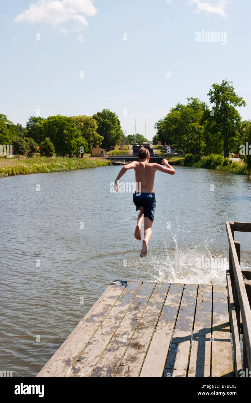 Children jump lake water sweden hi-res stock photography and images - Alamy
