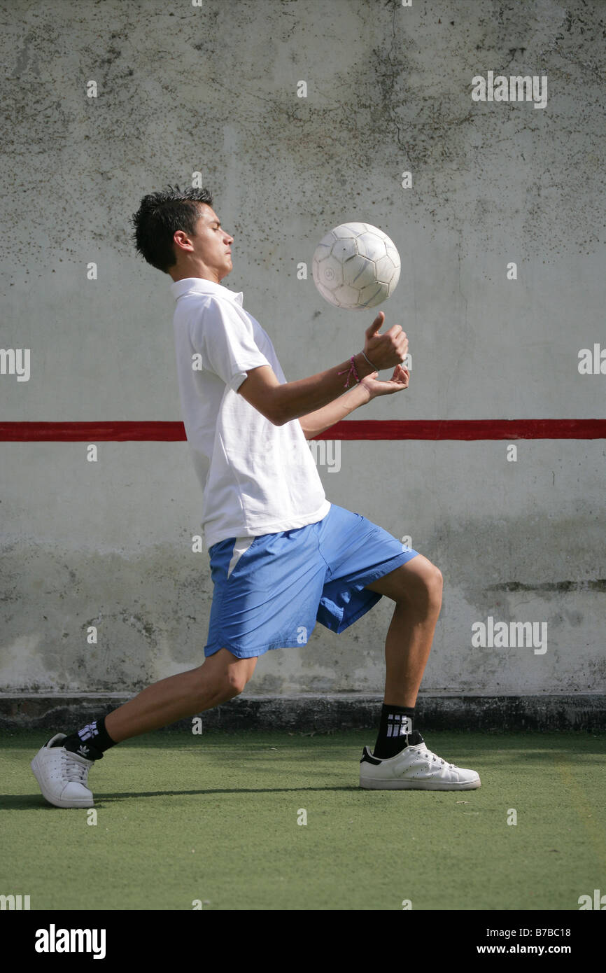 sixth former playing football Stock Photo - Alamy
