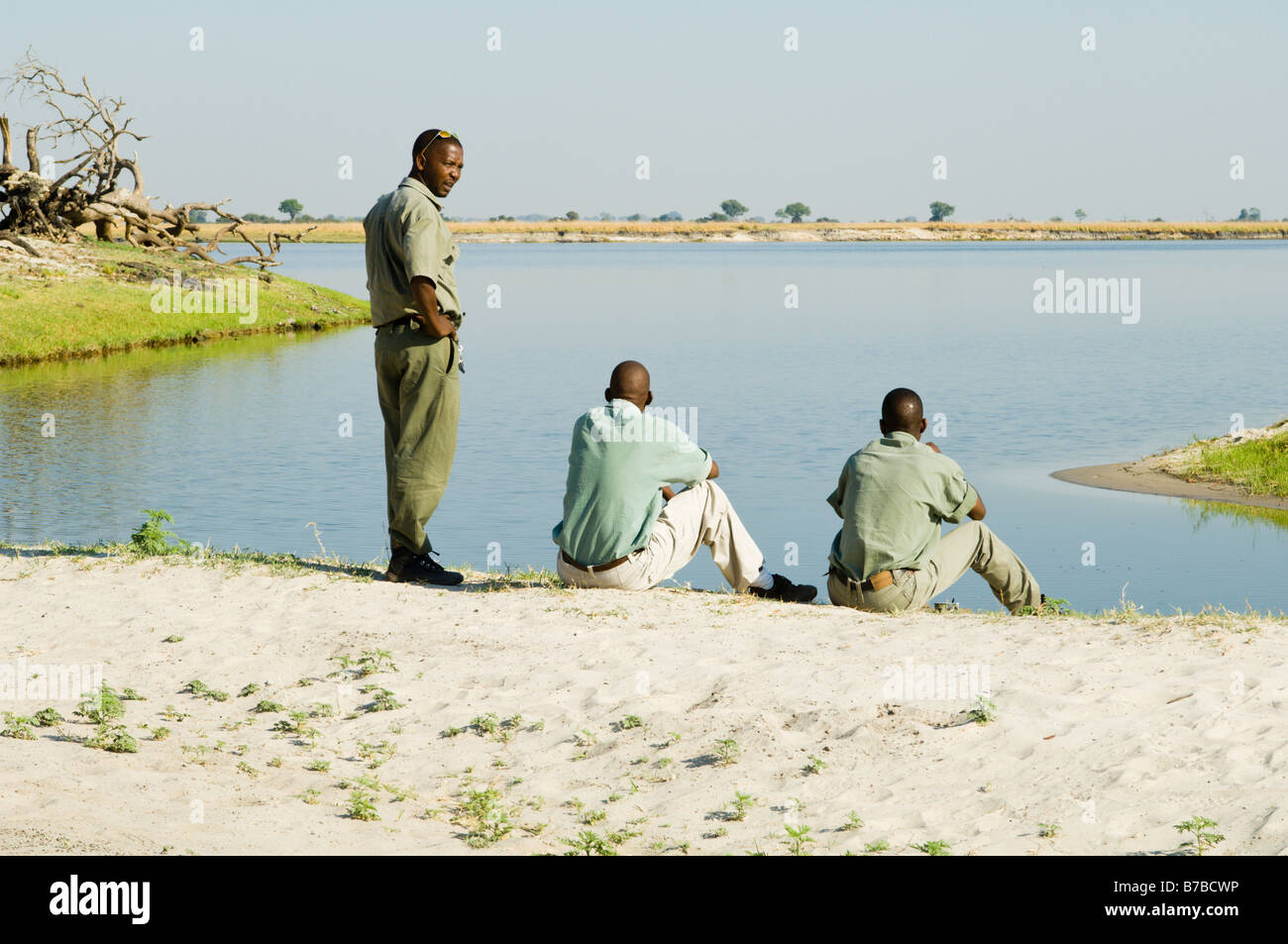 Tour guides beside the Chobe River in Botswana Stock Photo - Alamy