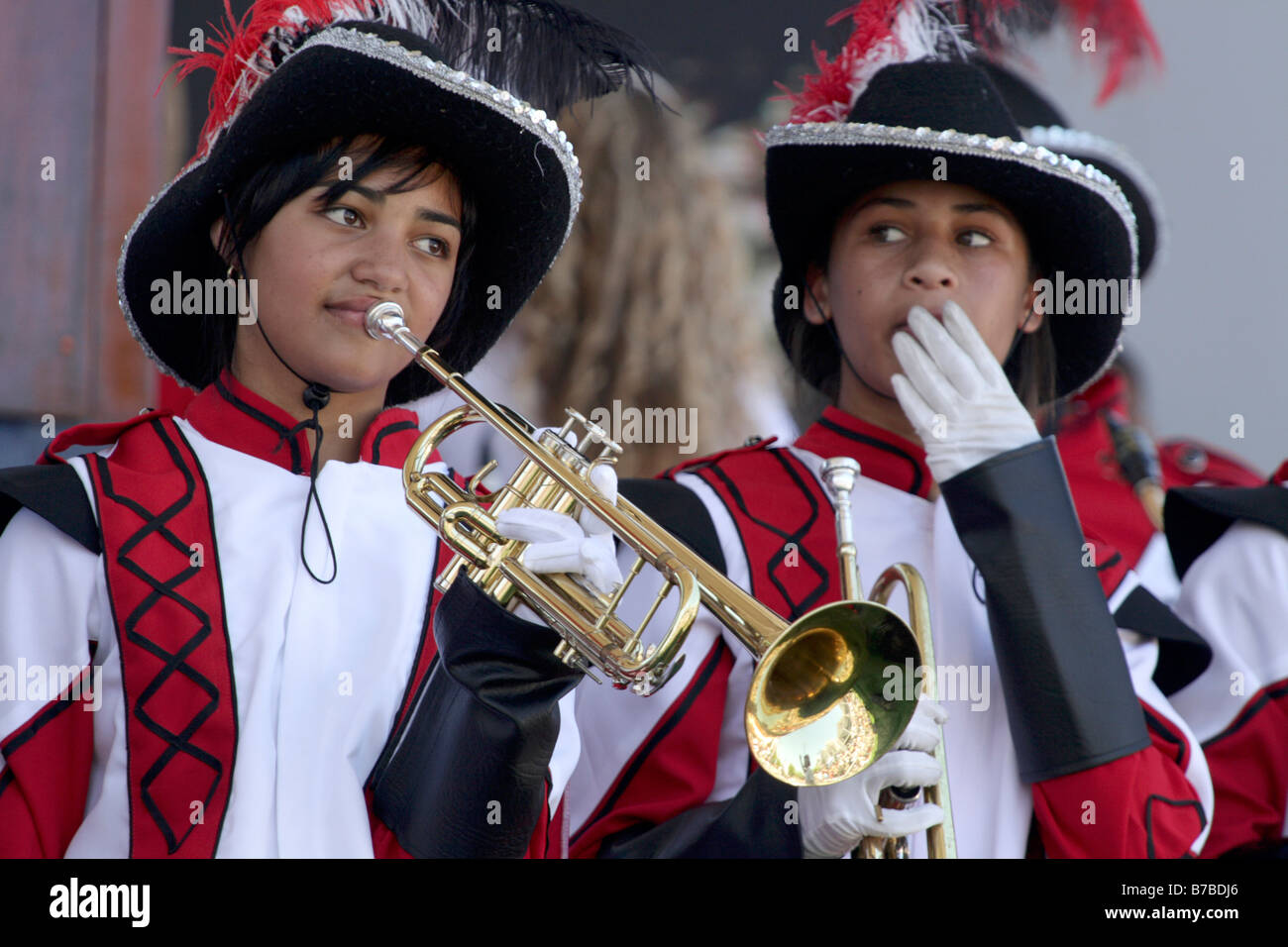 Two young girls playing in a brass band Stock Photo - Alamy