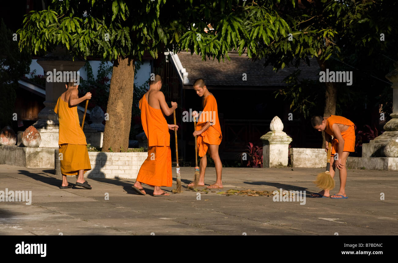 Buddhist monk sweeping hi-res stock photography and images - Alamy