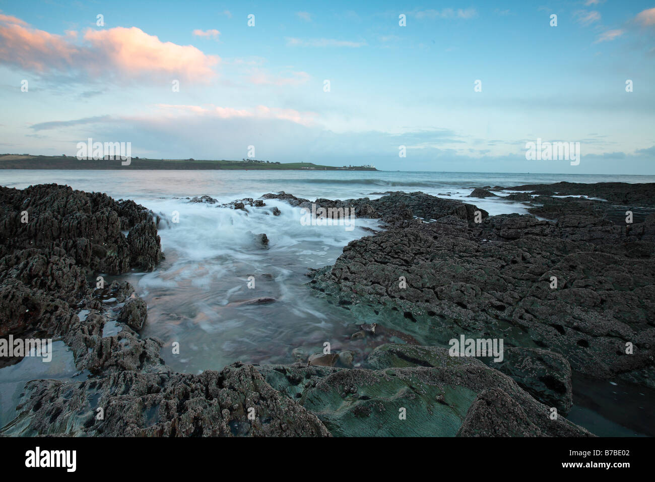 Church bay at sunset Stock Photo - Alamy