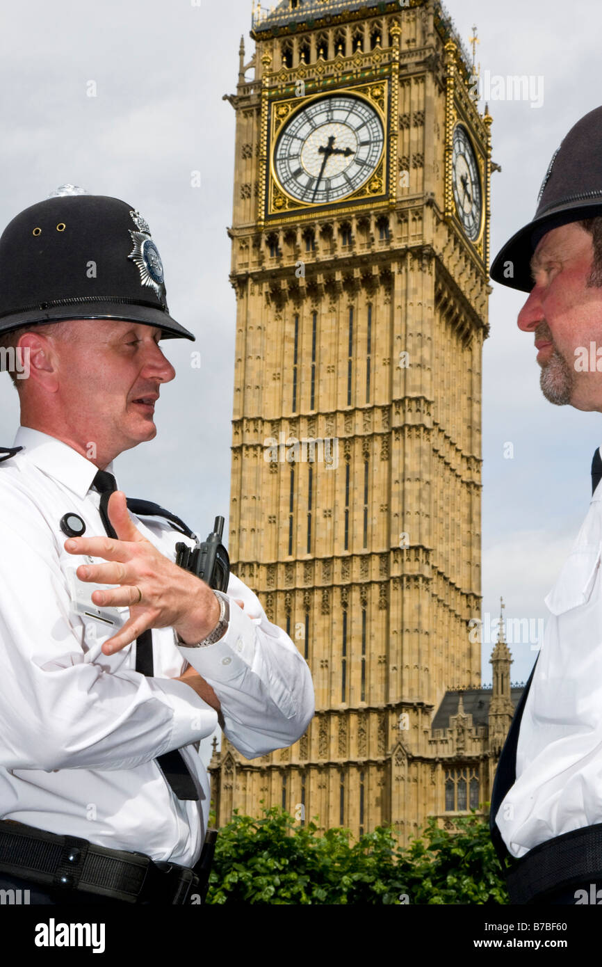 Two Policemen talking with Big Ben in the background London England ...