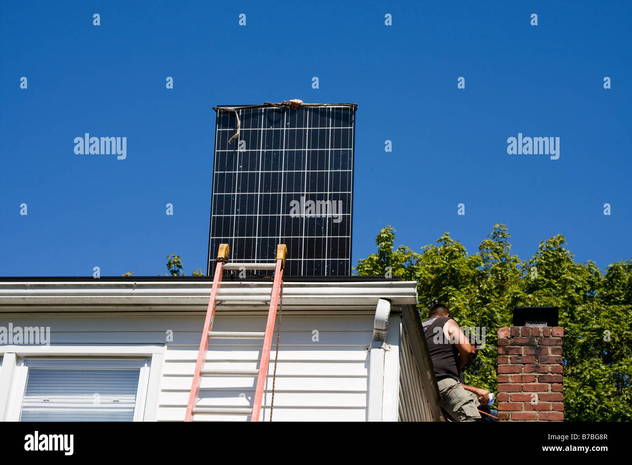 Photovoltaic Solar Panel Installation on House Stock Photo - Alamy