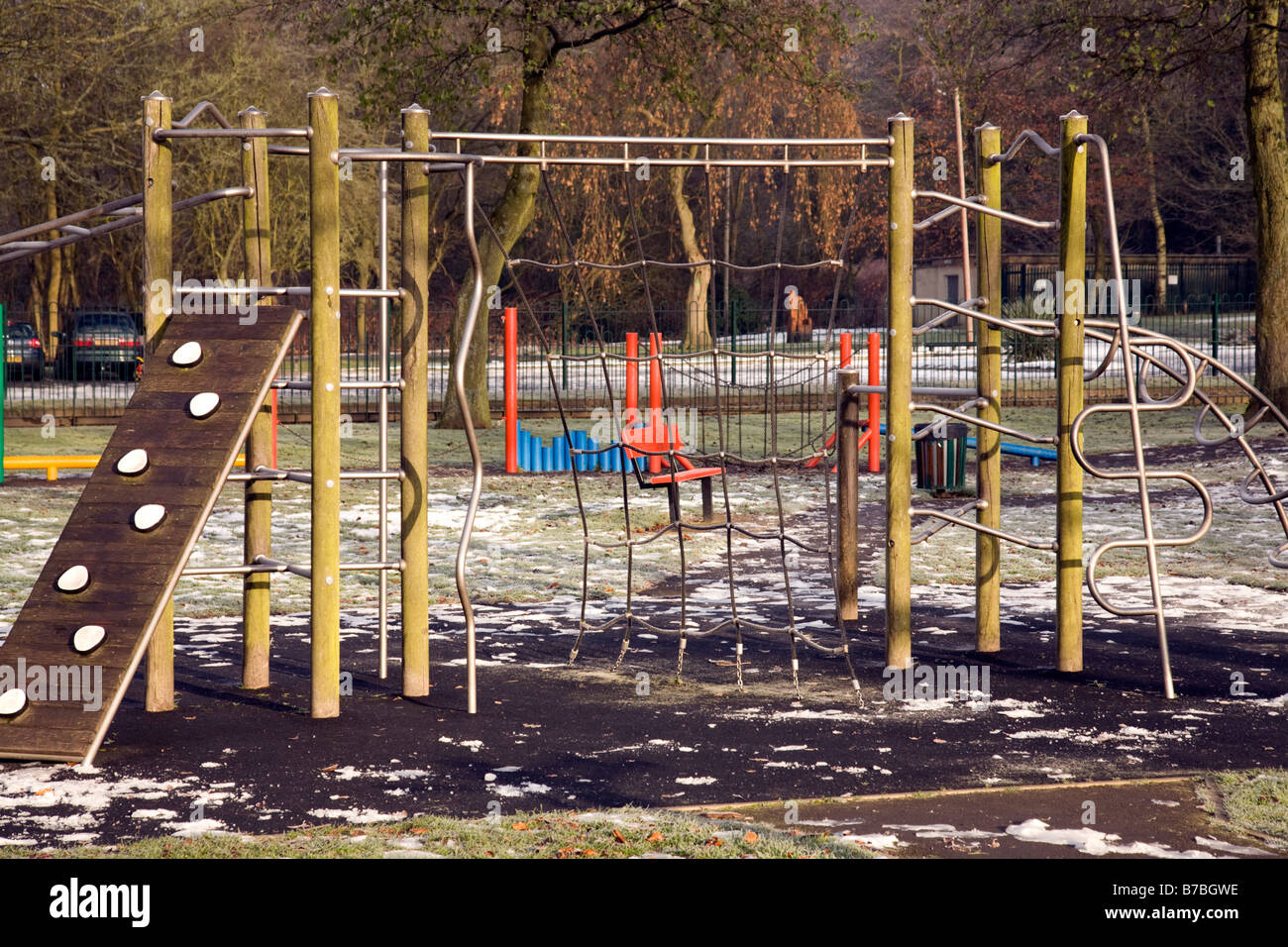 Childrens playground in Ramsbottom England on a snow and icy winters ...