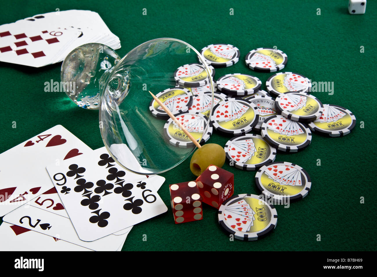 Las Vegas type card deck and poker chips with spilet Martini Glass on ...