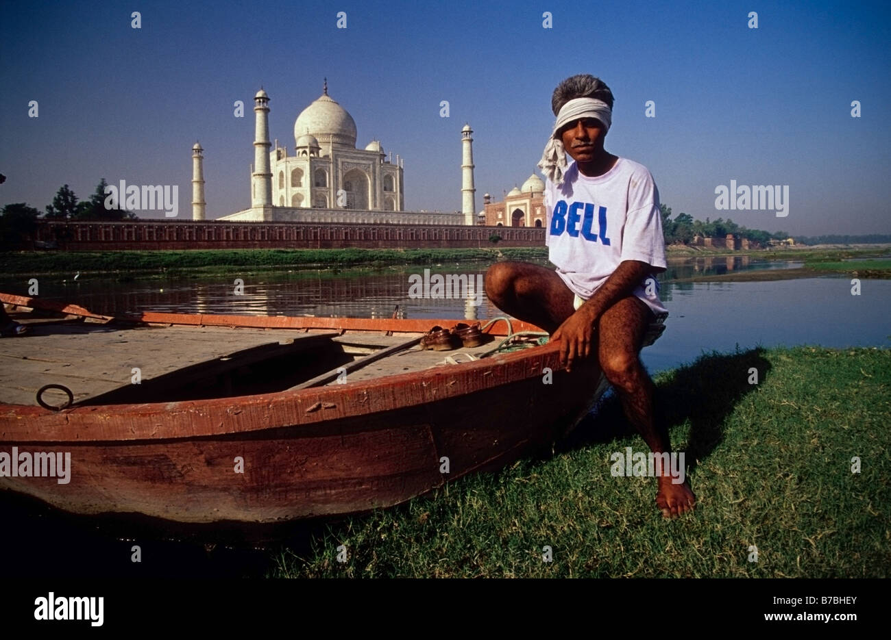 Ferry man with his boat, Agra India Stock Photo - Alamy