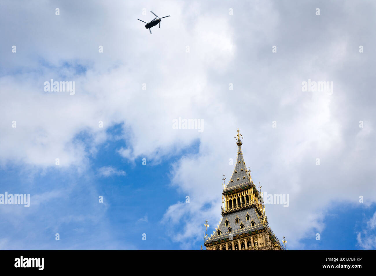 Chinook helicopter flying over Big Ben and the Houses of Parliament ...