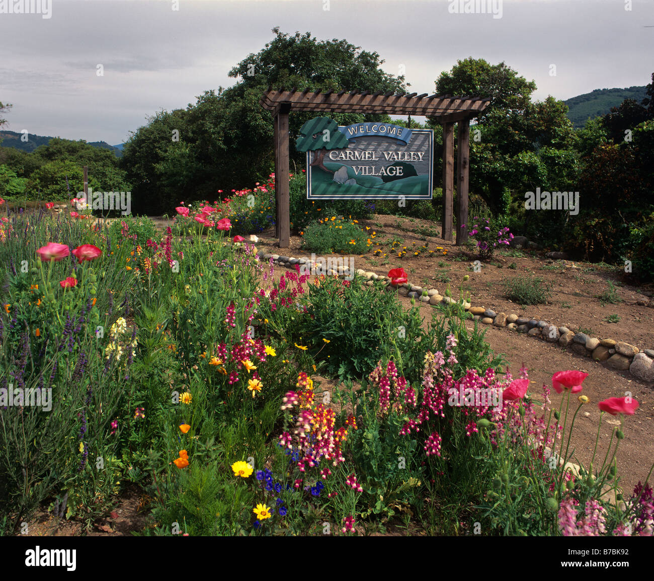 Welcome to CARMEL VALLEY VILLAGE sign with flower display CALIFORNIA ...