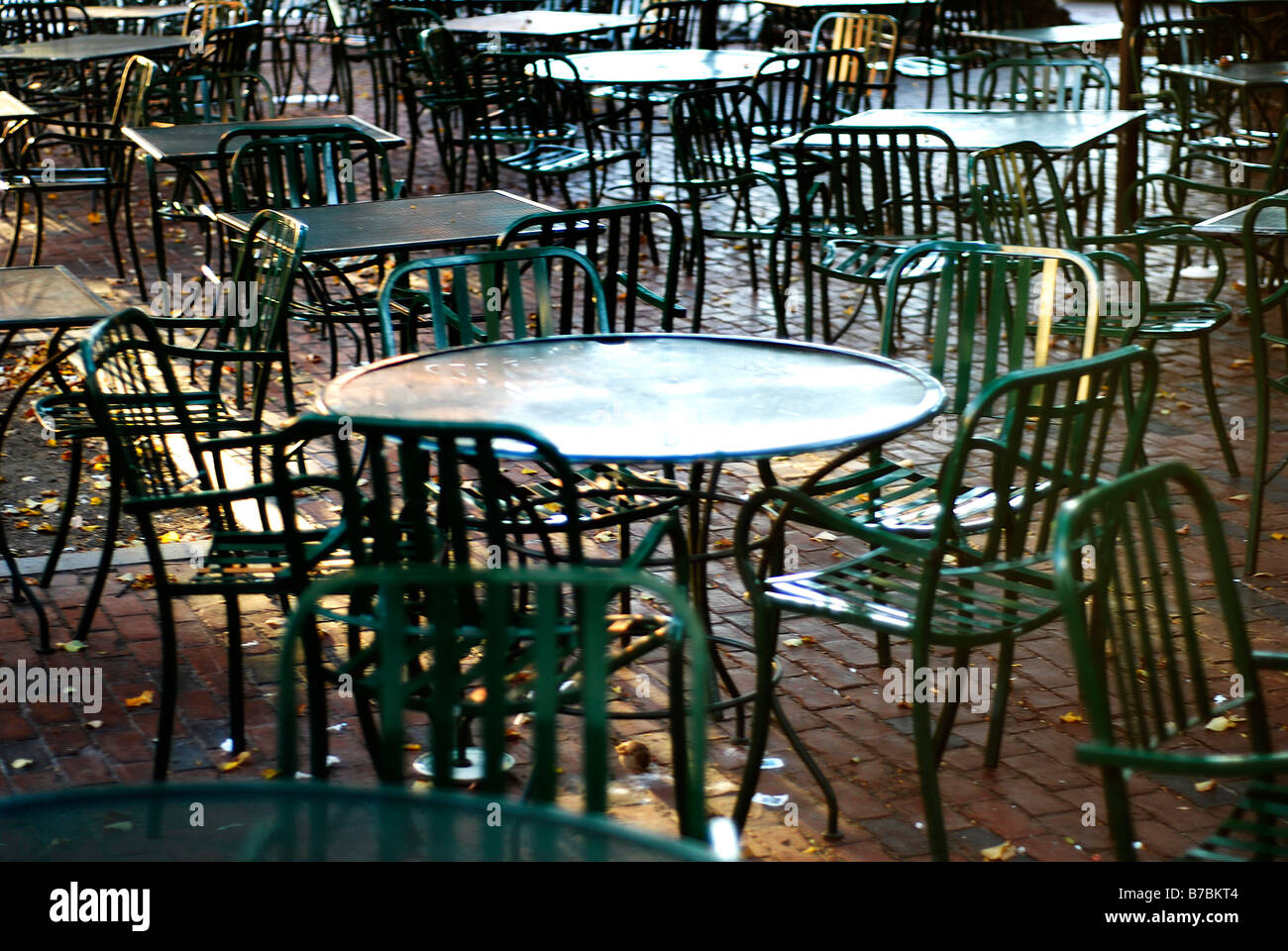 Empty tables and chairs Stock Photo - Alamy
