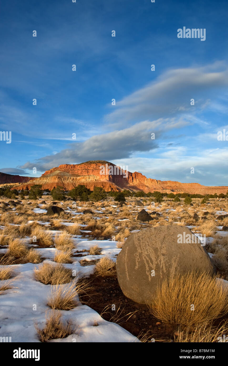 Looking out towards red sandstone cliffs at sunset Stock Photo - Alamy