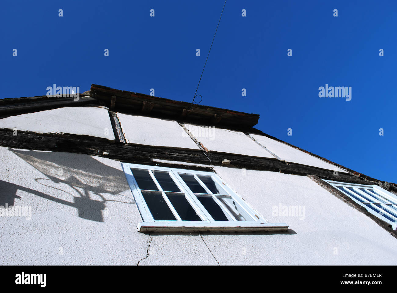 Whitewashed building with wooden beams Stock Photo - Alamy