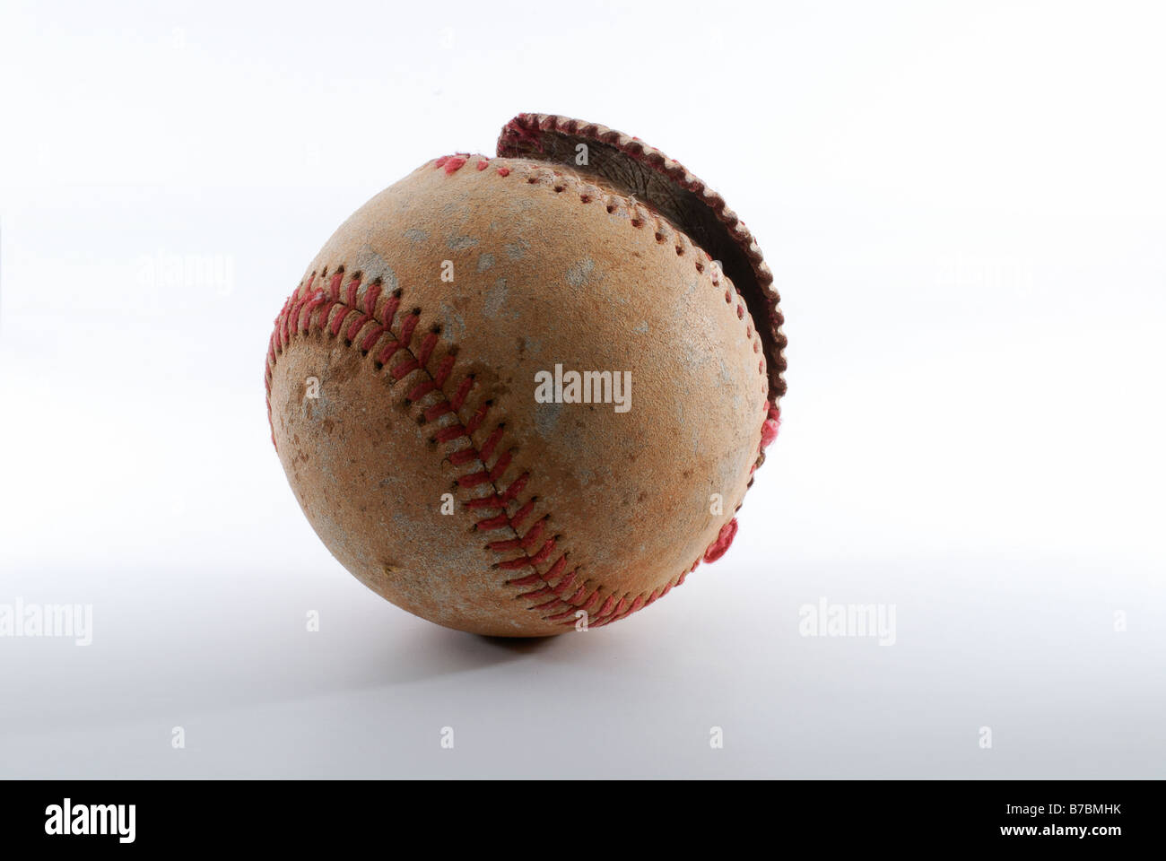 Old worn out baseball Stock Photo - Alamy