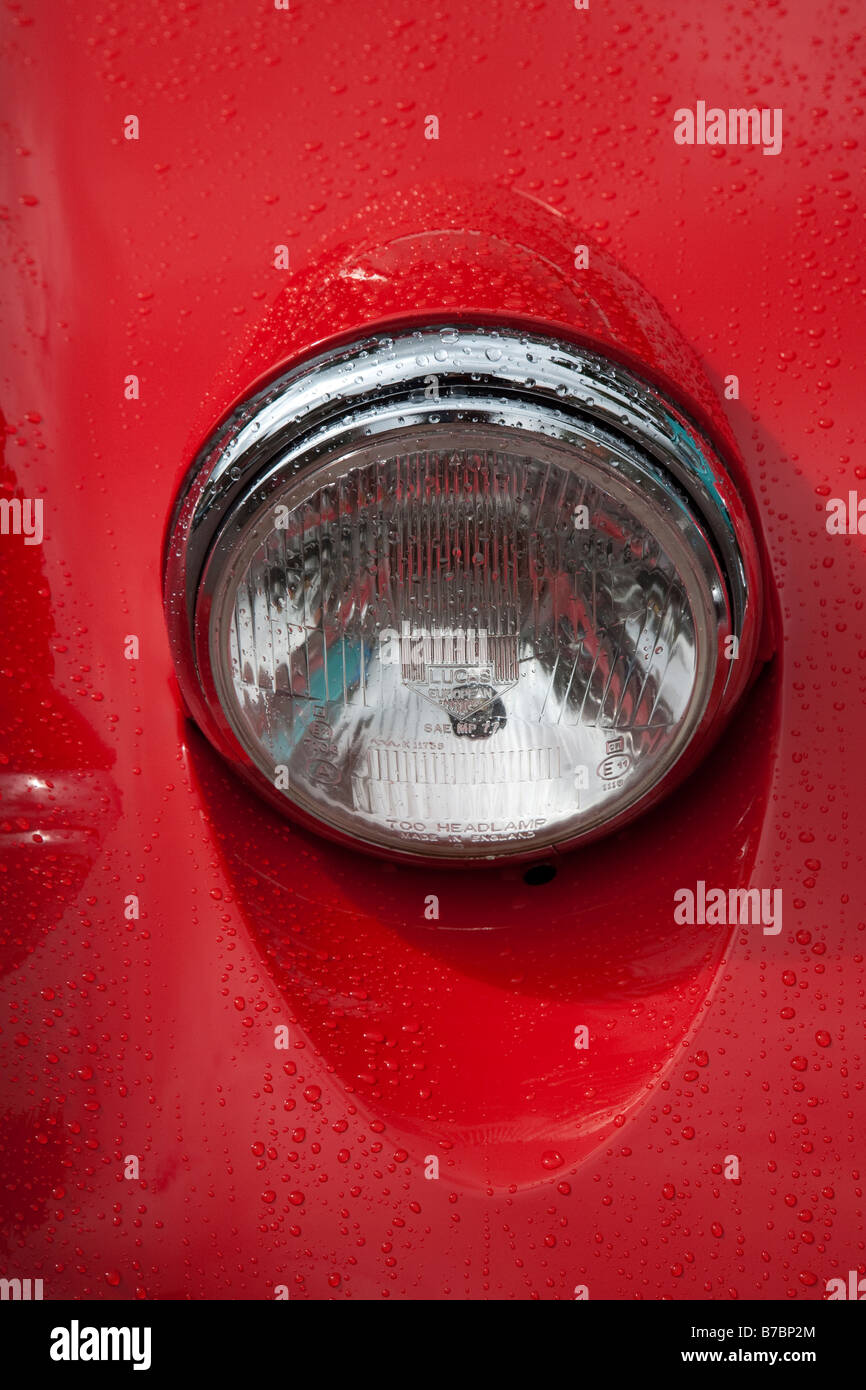 Lucas headlight in classic car Triumph Sprite Stock Photo - Alamy
