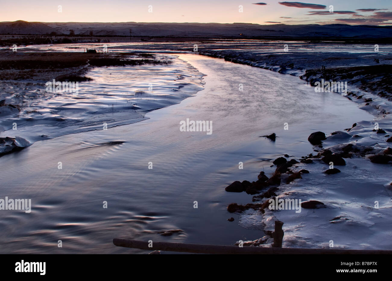 Chilly, icy landscape of the Fremont river in Utah at sunset Stock ...