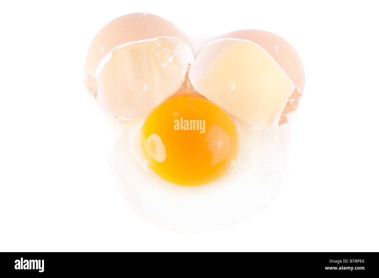 uncooked broken egg isolated on white background Stock Photo - Alamy