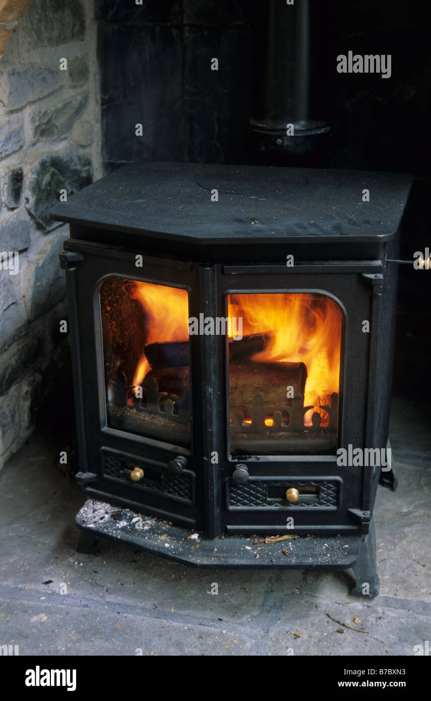 Log burning stove Stock Photo - Alamy