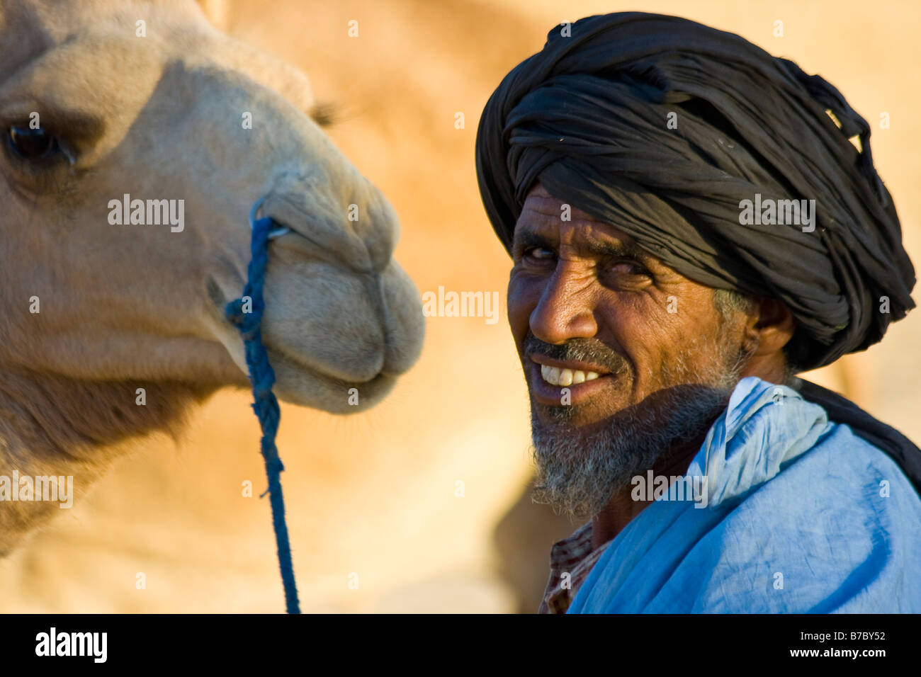 Tuareg Man with his Camel in Timbuktu Mali Stock Photo - Alamy